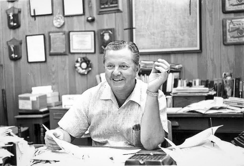 Mr. Fain’s Maroon Upholstered Chair - Gary Borders